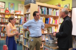 Father Collins signs new book Pope Francis at Porter Square Books